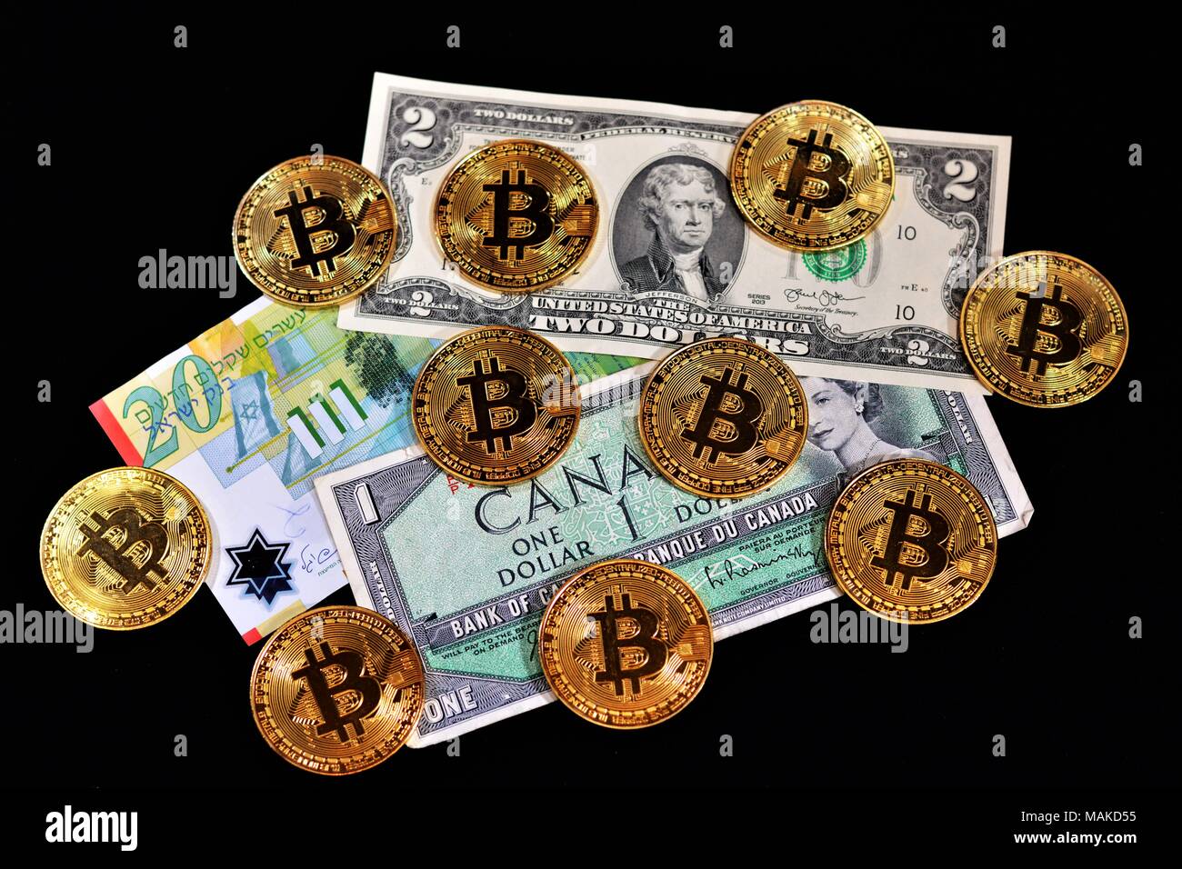 Bit coins with silver dollars and diamonds Stock Photo - Alamy