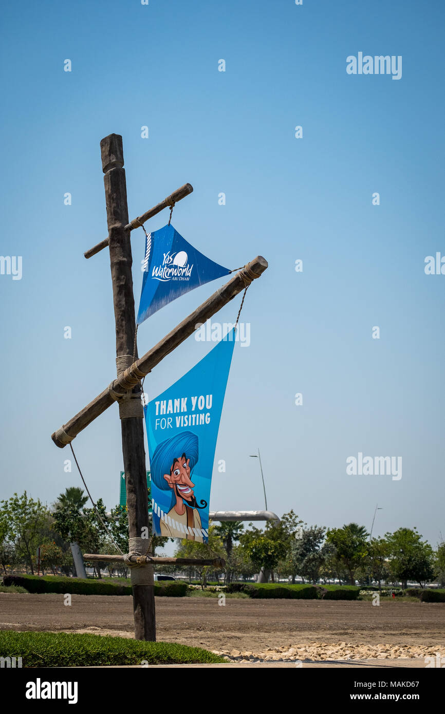 A vertical banner on road side displaying "Thank you for visiting" Yas ...