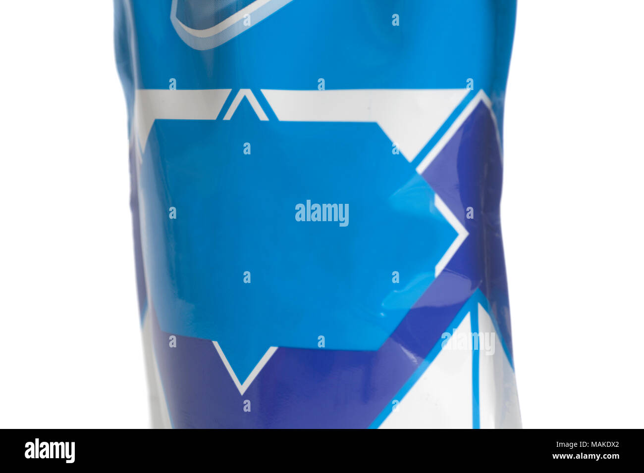 Blue packaging condenced milk on a white background Stock Photo - Alamy