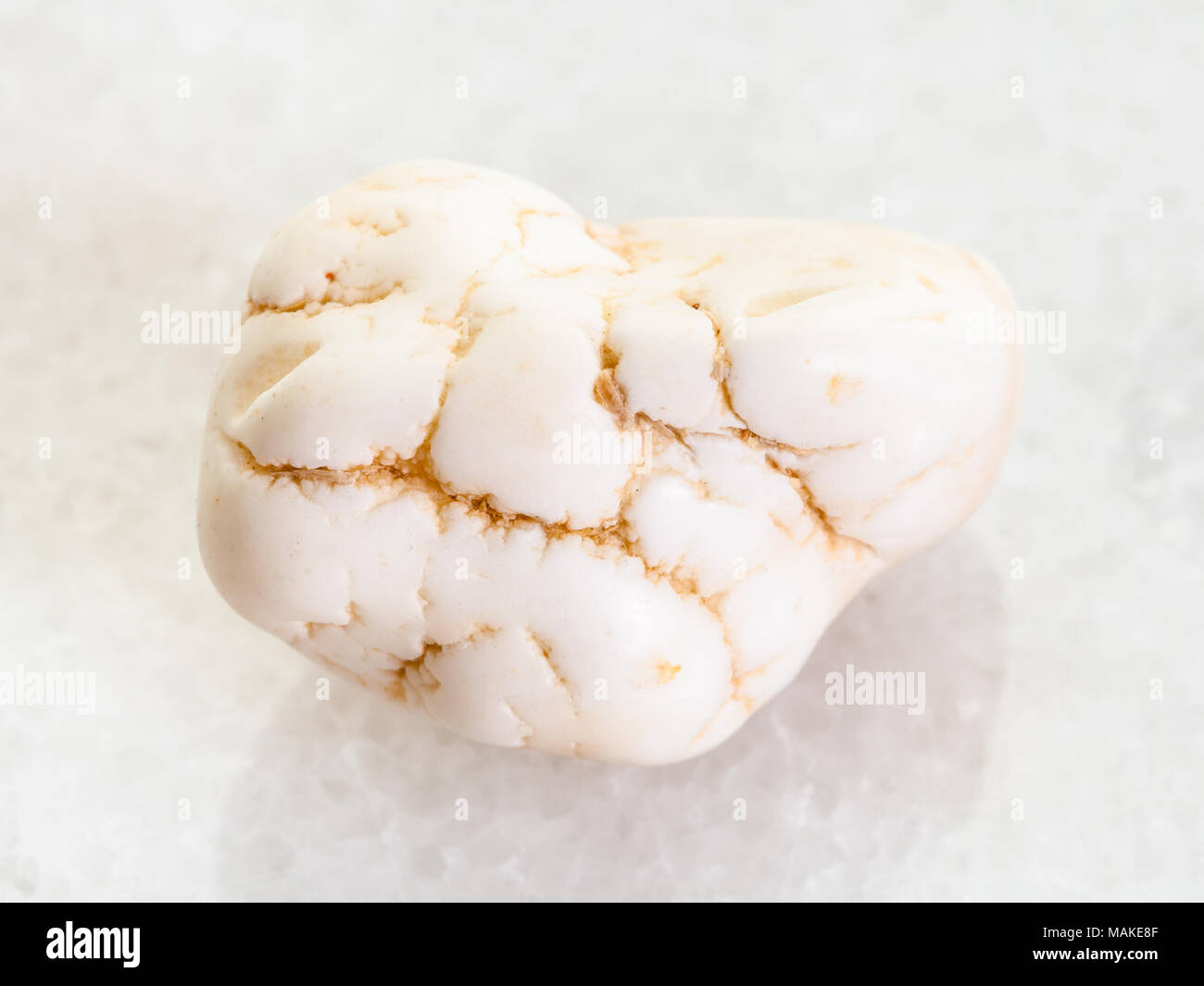 macro shooting of natural mineral rock specimen - polished magnesite ...