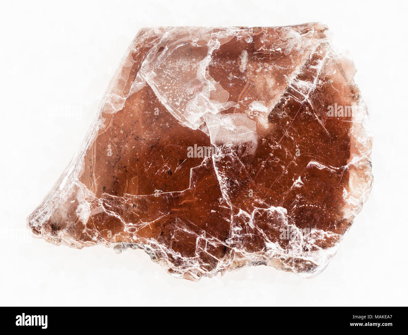 macro shooting of natural mineral rock specimen - raw brown mica lamina ...