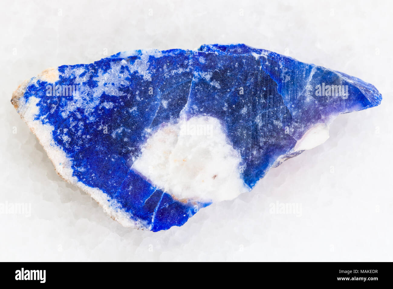 macro shooting of natural mineral rock specimen - raw lazurite (lapis ...