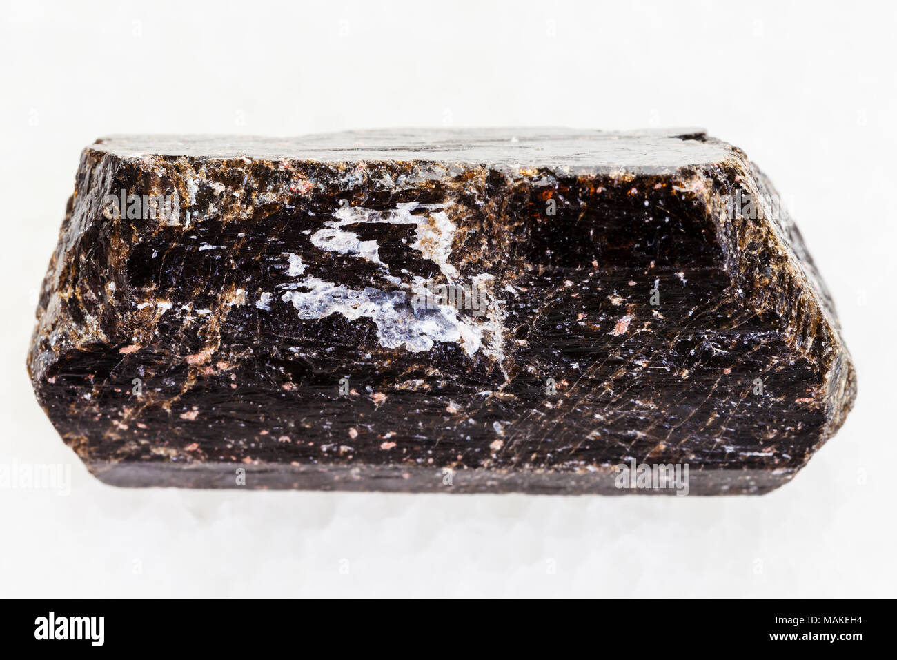 macro shooting of natural mineral rock specimen - crystal of dravite ...