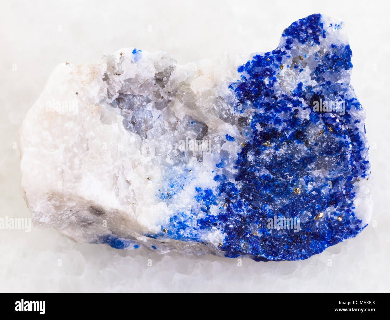 macro shooting of natural mineral rock specimen - lapis lazuli stone on ...