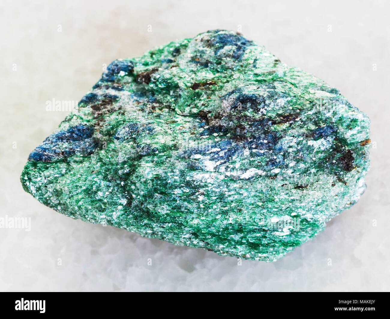 macro shooting of natural mineral rock specimen - raw Fuchsite (chrome ...