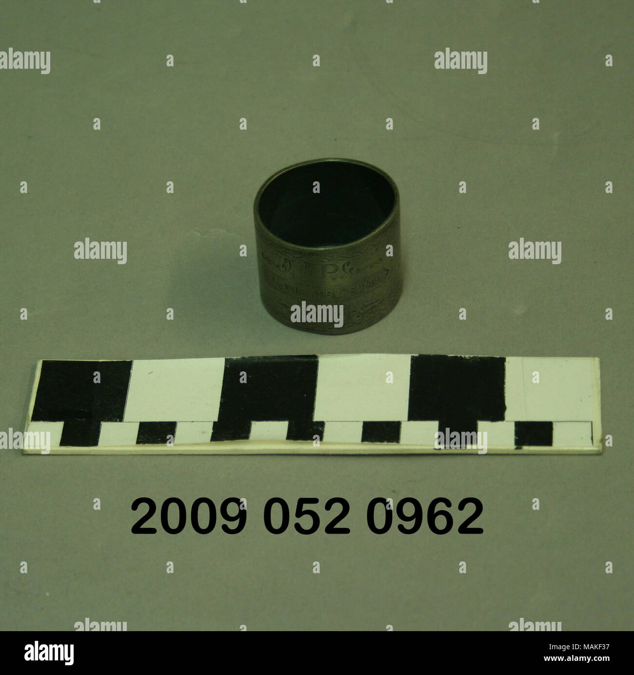 Pewter napkin Ring with a simple vine border. This is a souvenir from ...