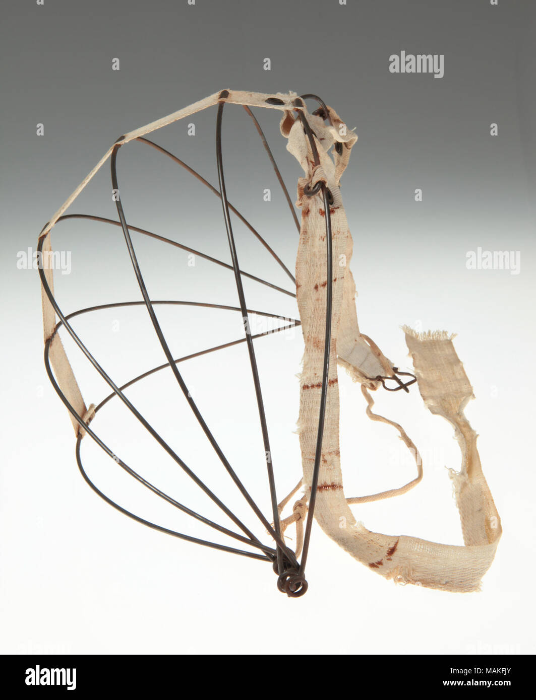 Woman's Metal Frame Bustle with Ecru cotton twill tape belt. Title ...