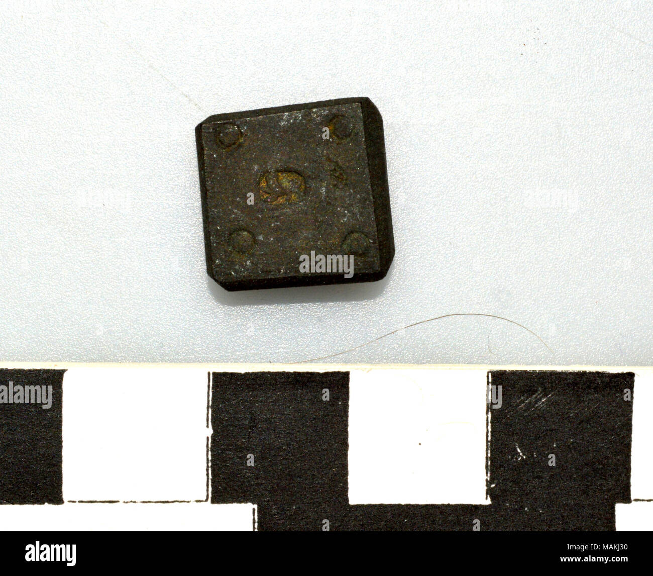 Small metal weight for use with a scale. May have been used by Dr. John ...