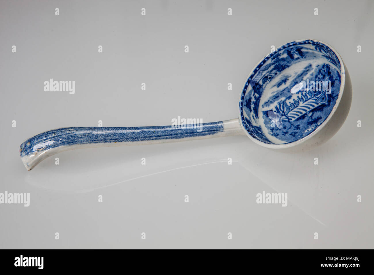 Ceramic sauce tureen with a ceramic ladle, printed in blue on white ...