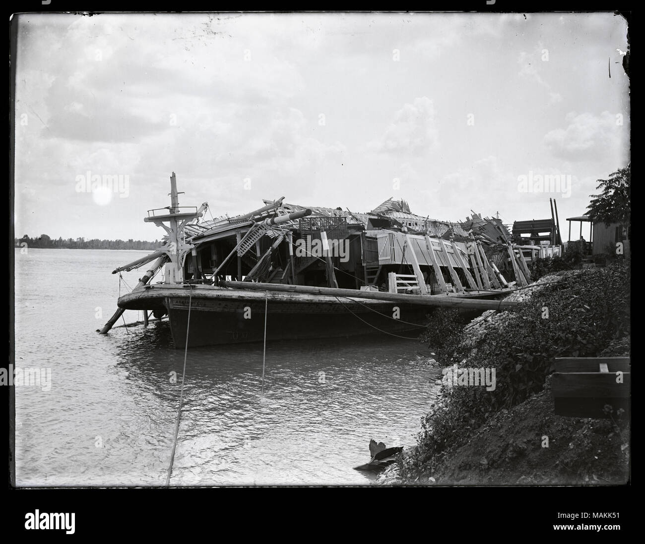 Horizontal, black and white photograph showing the destruction of the ...