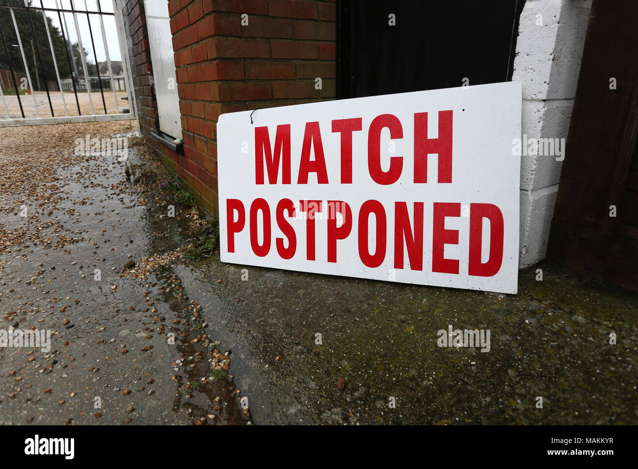 A Match Postponed sign outside Pagham Football Club in West Sussex, UK ...