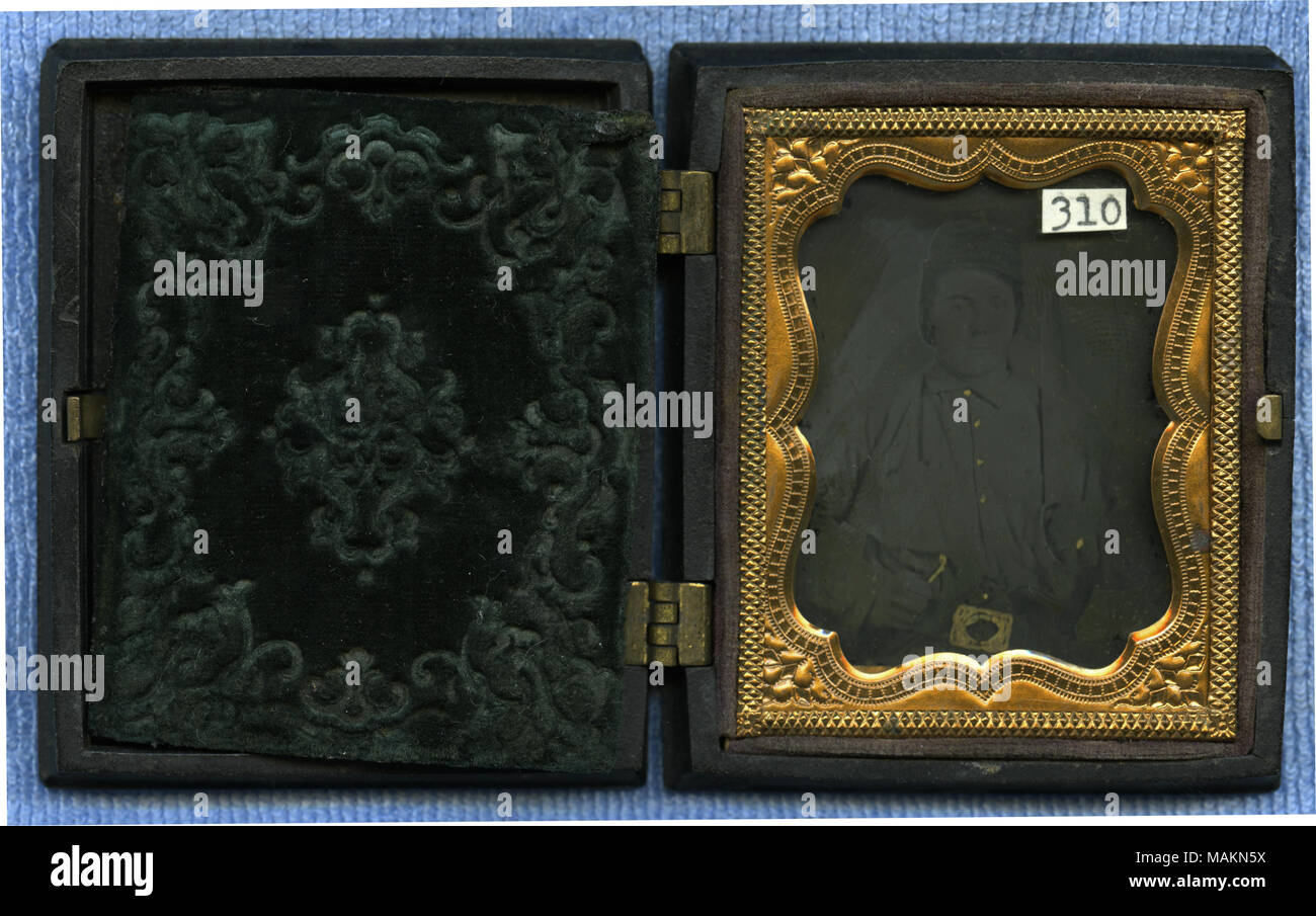 Cased ambrotype with a young man shown from the waist up, wearing a ...