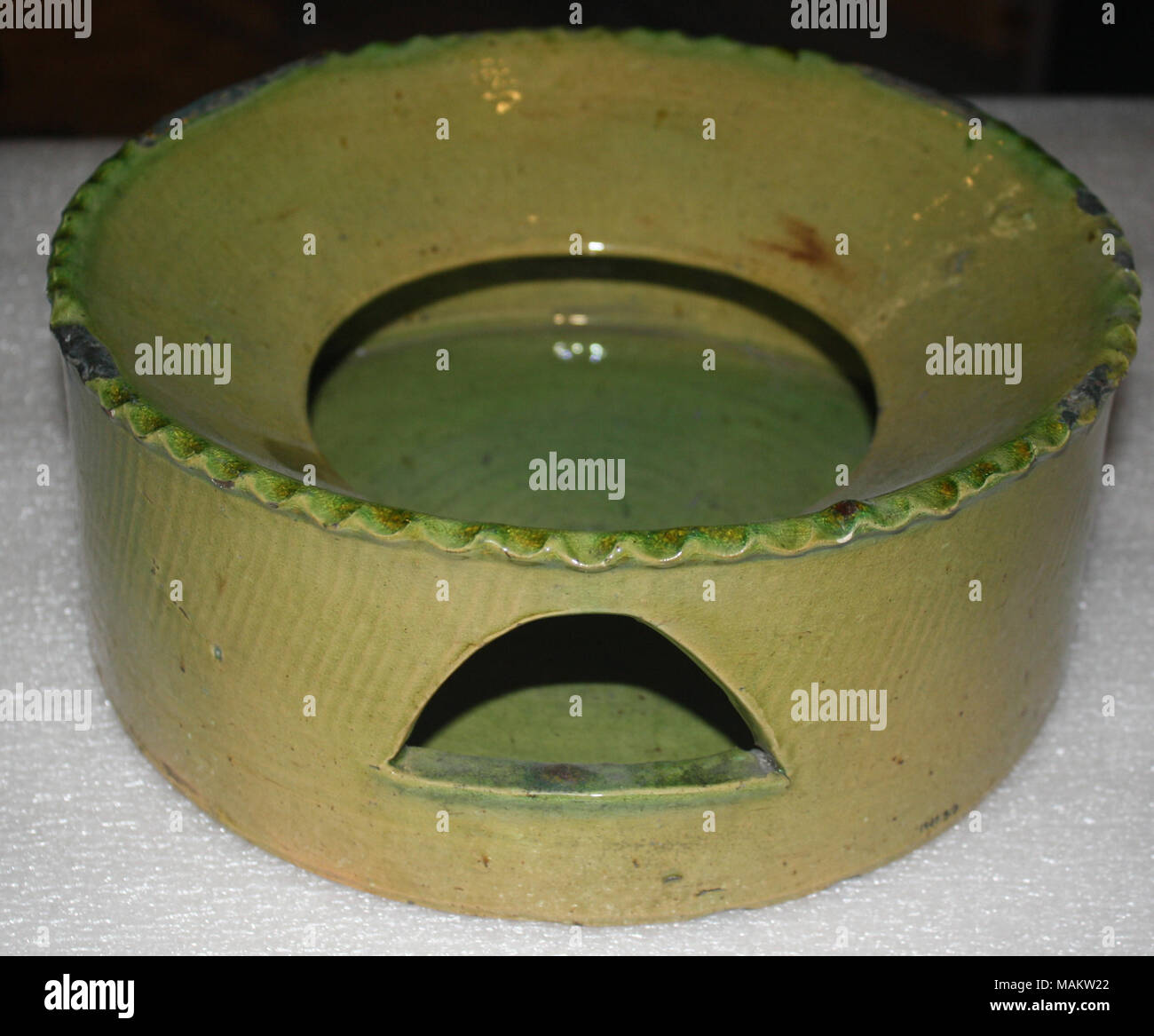 Green-glazed ceramic spittoon made by St. Charles potter and German ...