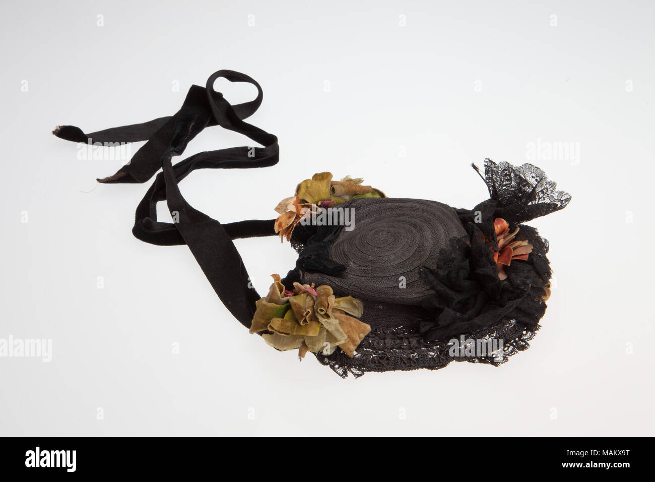 Woman's horsehair bonnet with flowers made by Grand Leader Millinery ...