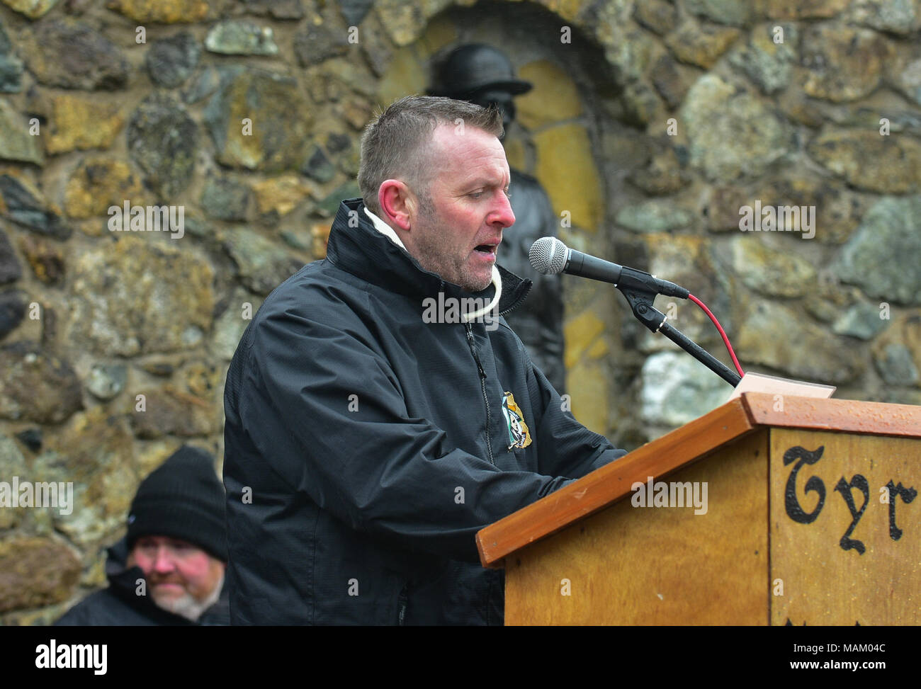Carrickmore, UK. 2nd April, 2018. Peter McCaughey reads the ...