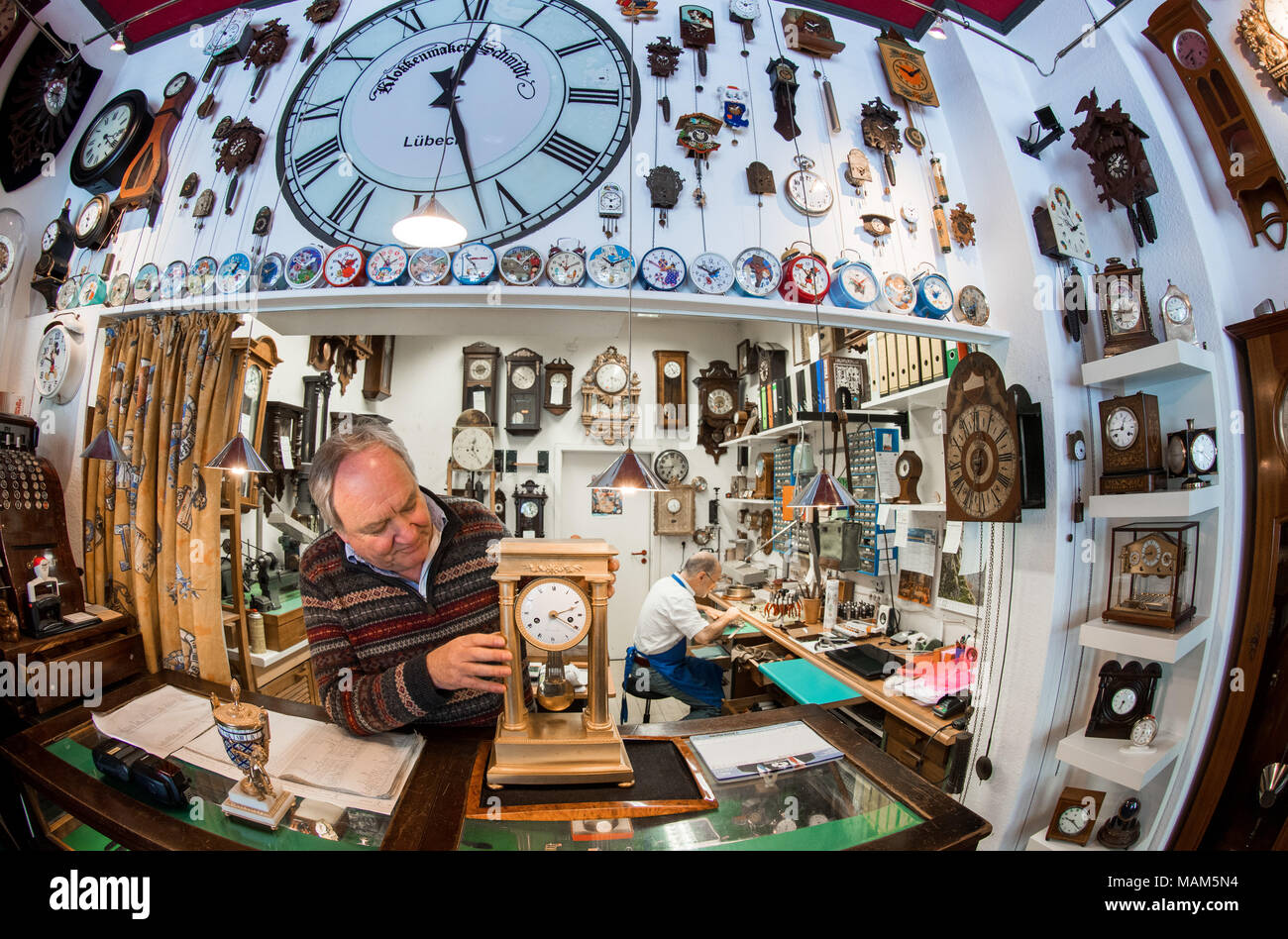 26 February 2018, Germany, Luebeck: A fire-gilded mantel clock from ...