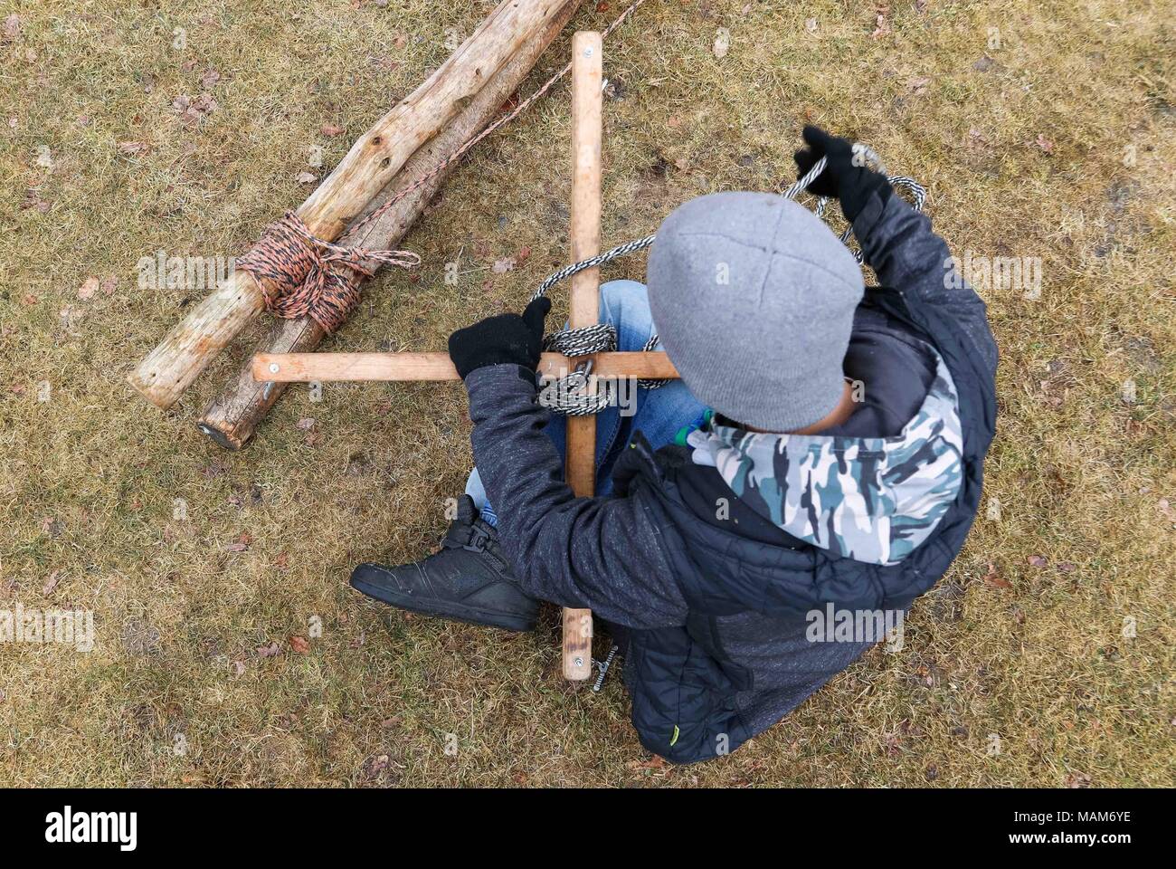 22 March 2018, Germany, Grossenkneten: A Pathfinder boy sitting on the ...