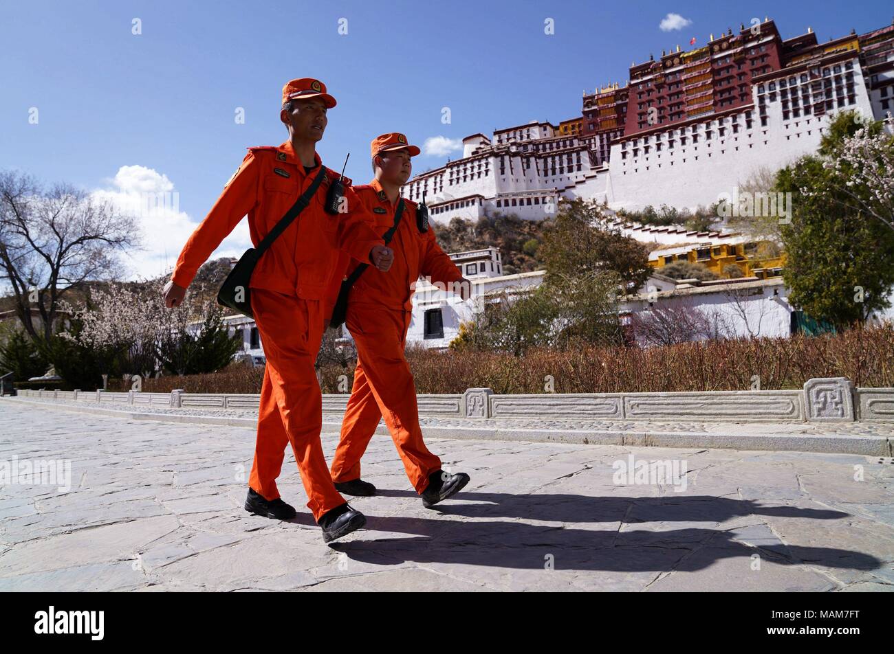 (180403) -- BEIJING, April 3, 2018 (Xinhua) -- Firefighters patrol at ...