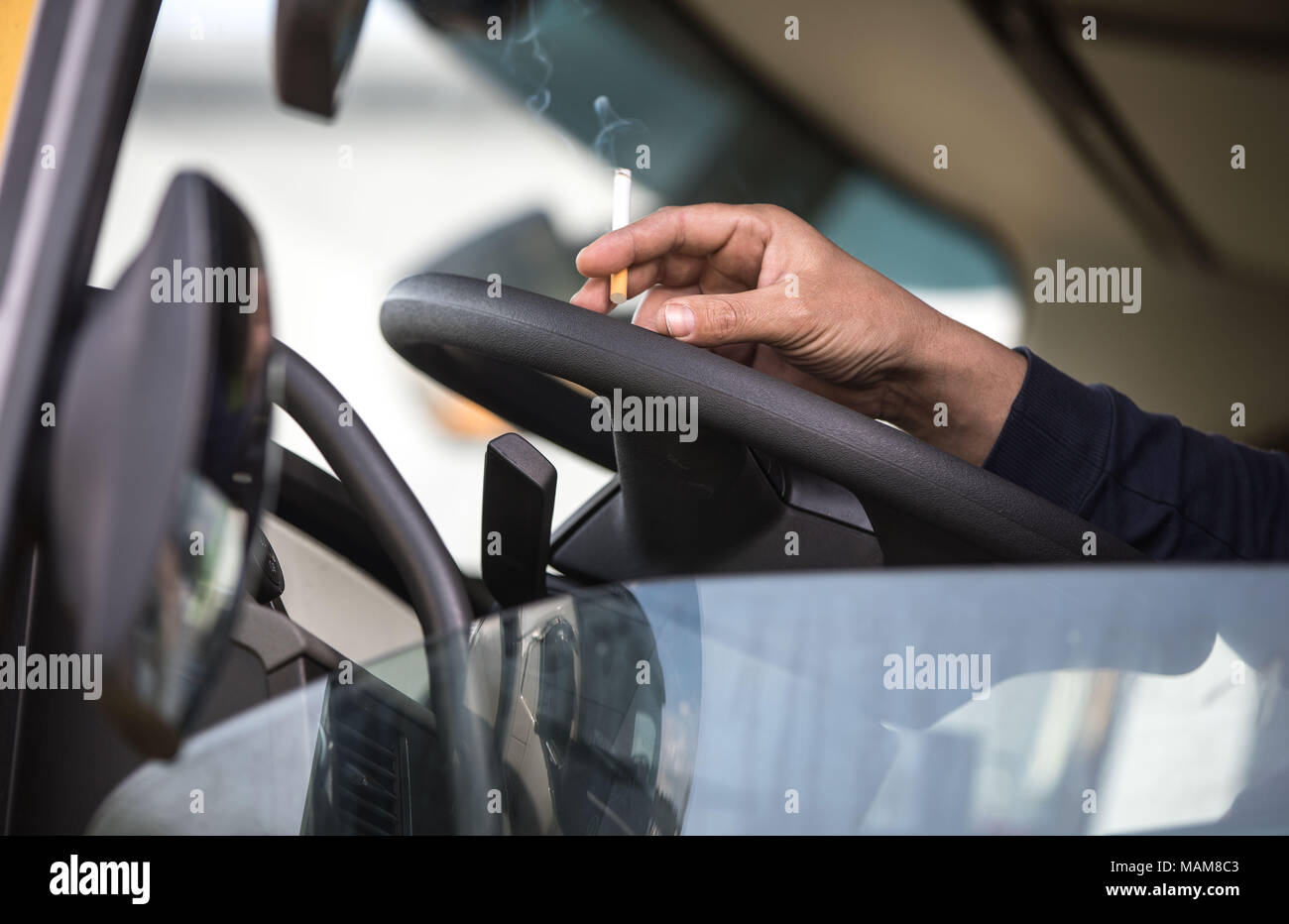 03 April 2018, Germany, Rodgau-Weiskirchen: A Romanian truck driver ...