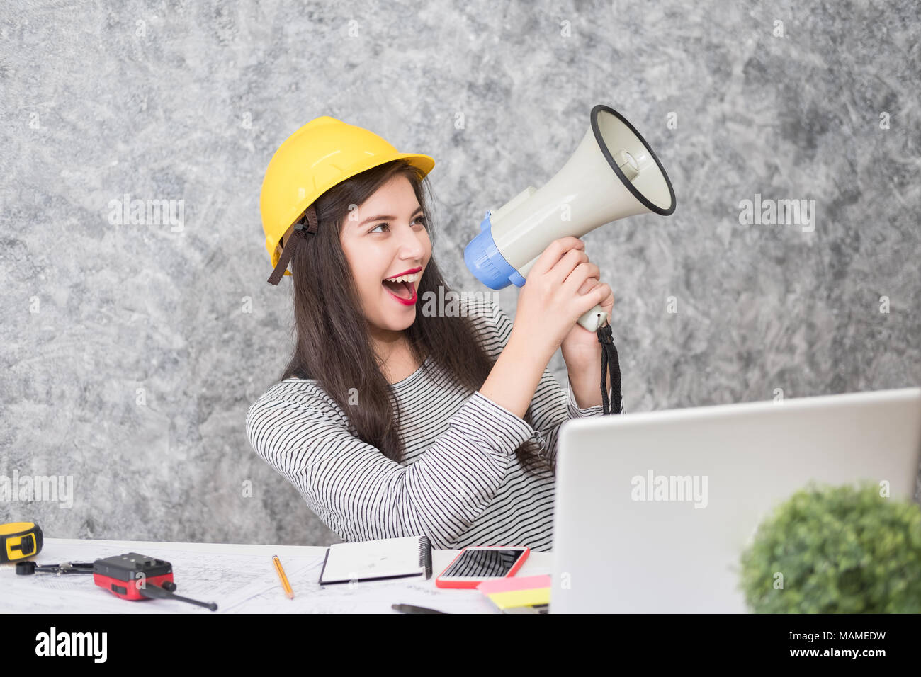 Lady using megaphone at protest hi-res stock photography and images - Alamy