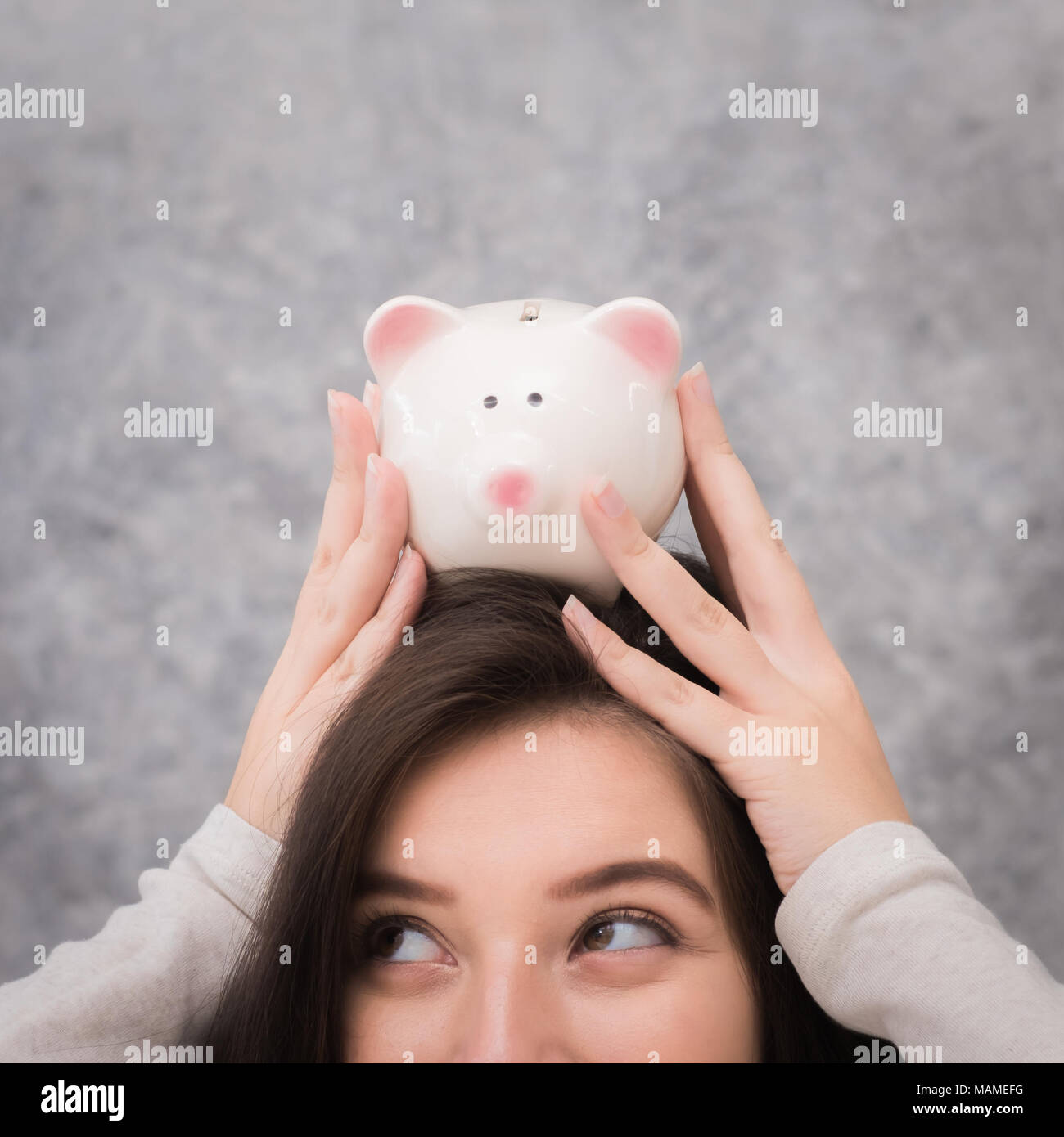 Girl saving money hi-res stock photography and images - Alamy