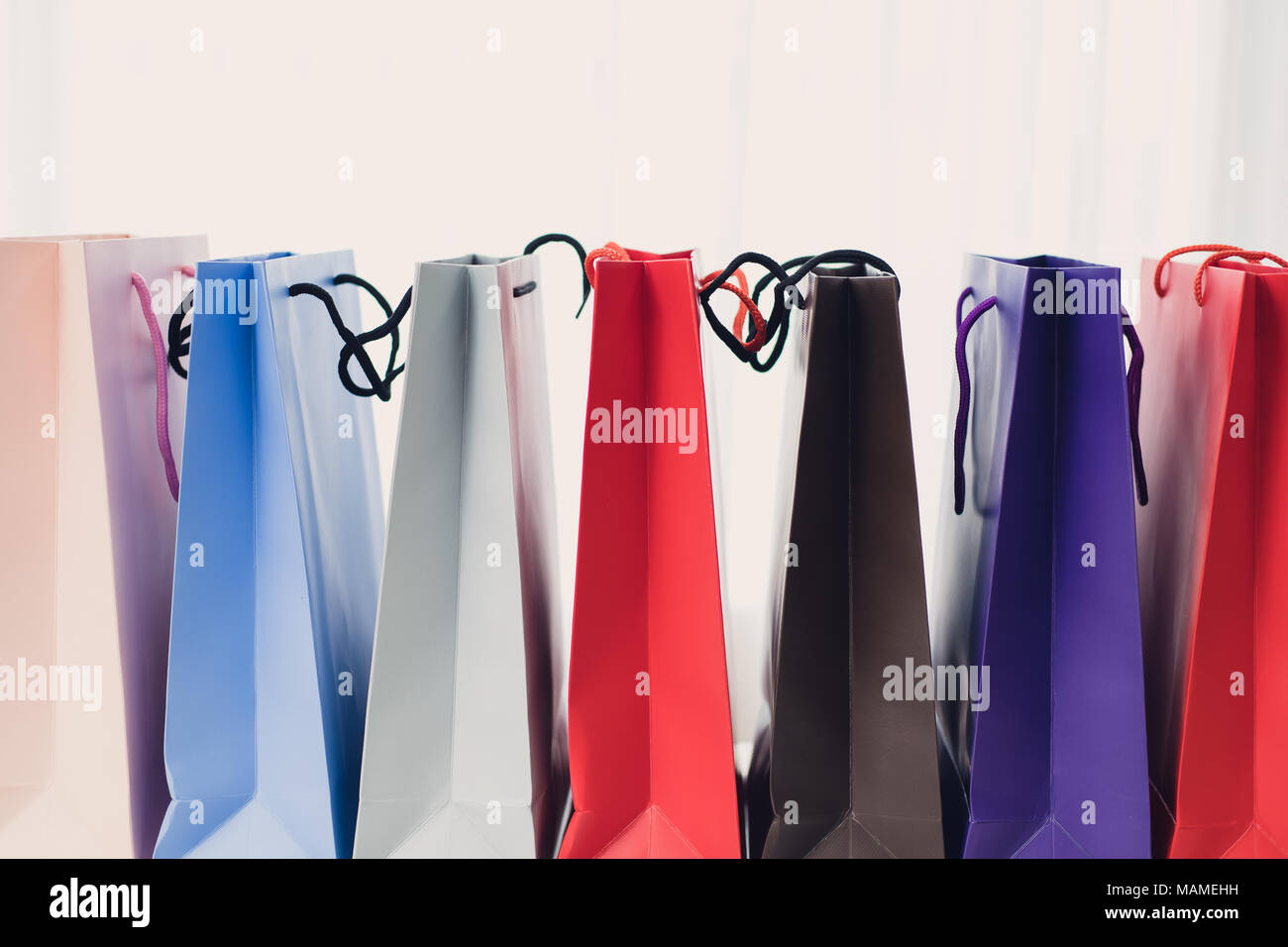 sale, consumerism, advertisement and retail concept - many colorful ...