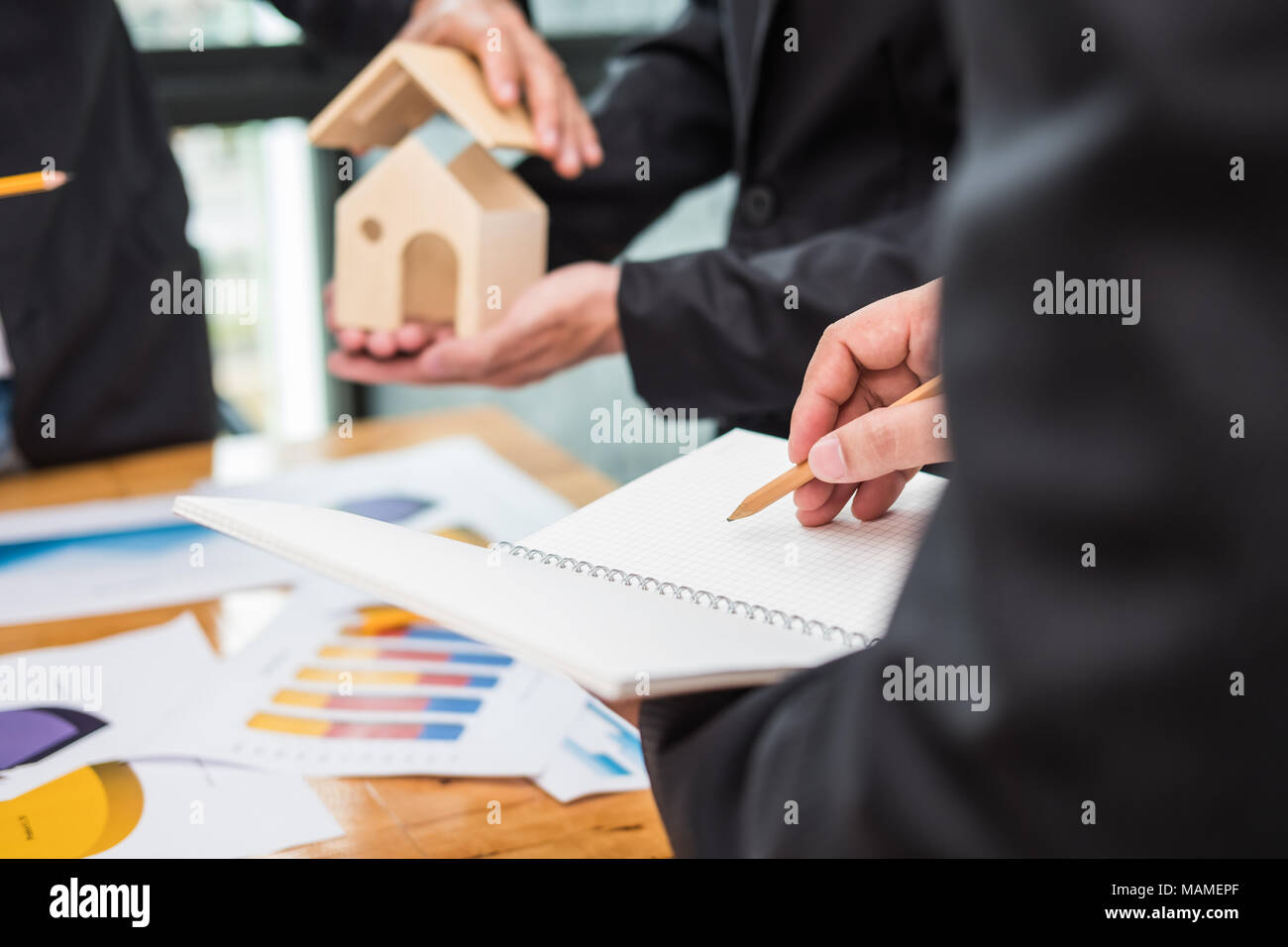 Housing company good teamwork, housing business concept Stock Photo - Alamy
