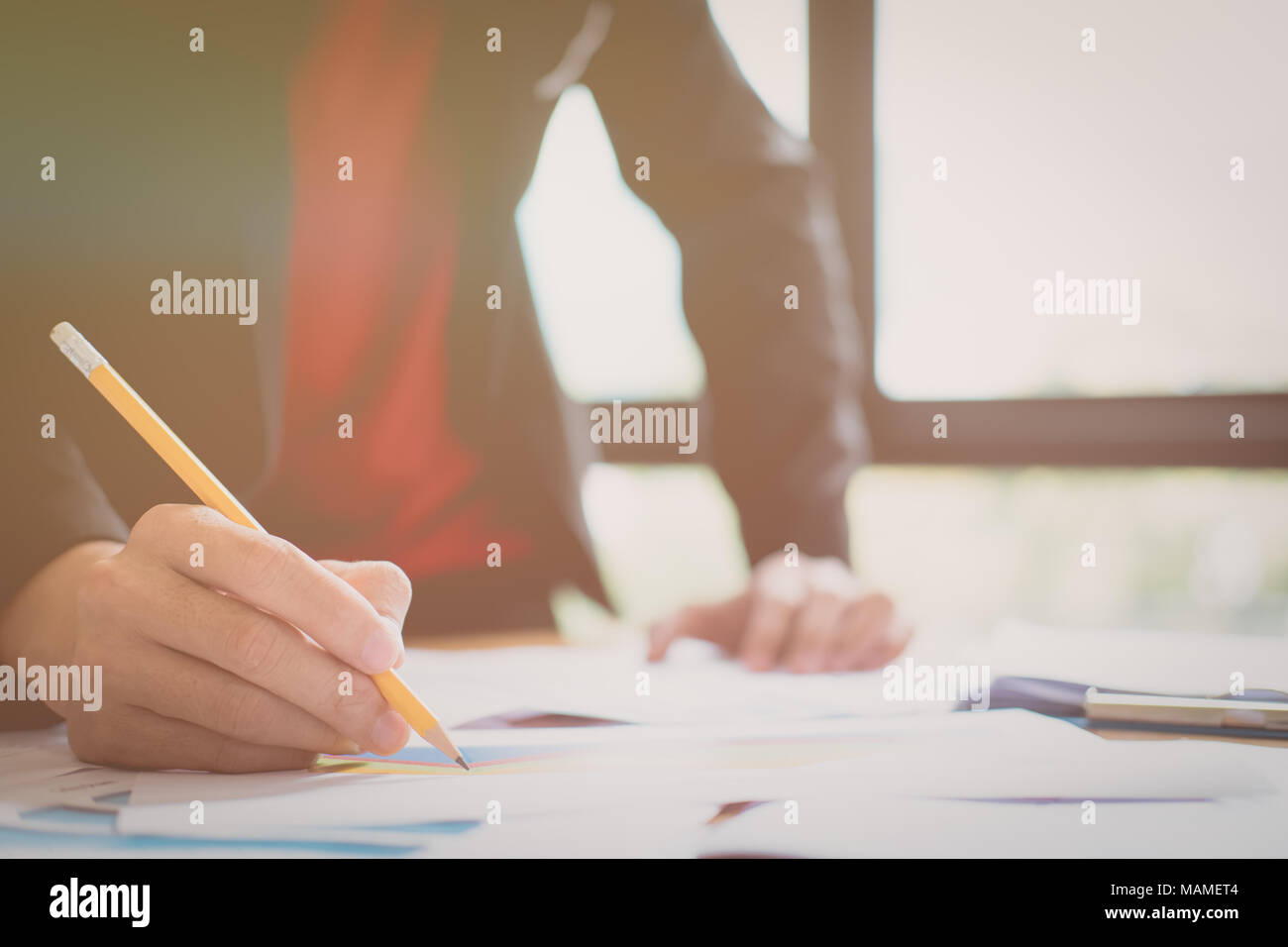 Businessmen meeting to discuss and consult on the future plans of their ...