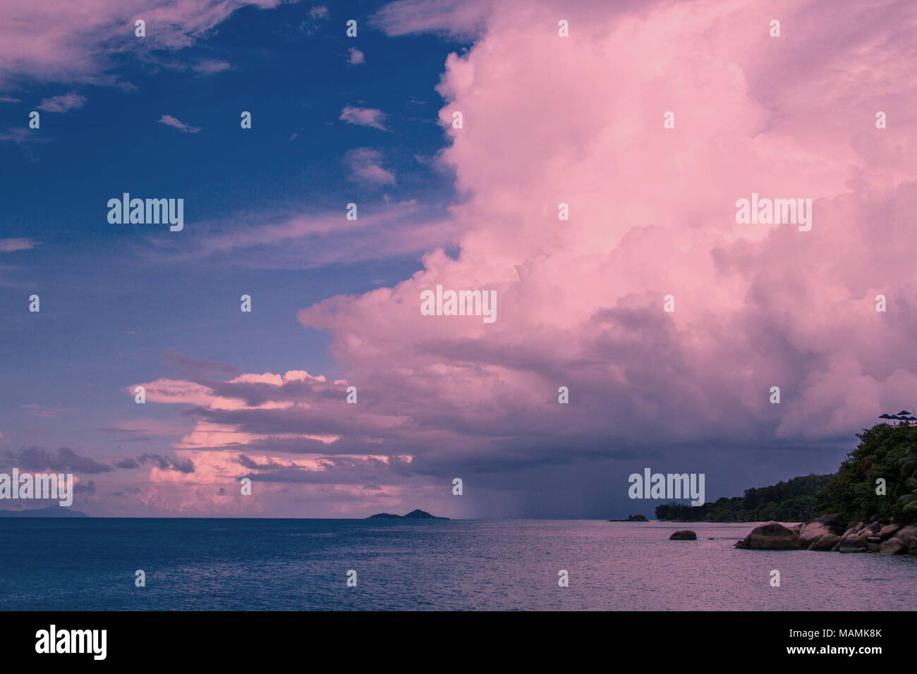 Ultra-violet storm clouds over Praslin Island Seychelles image with ...
