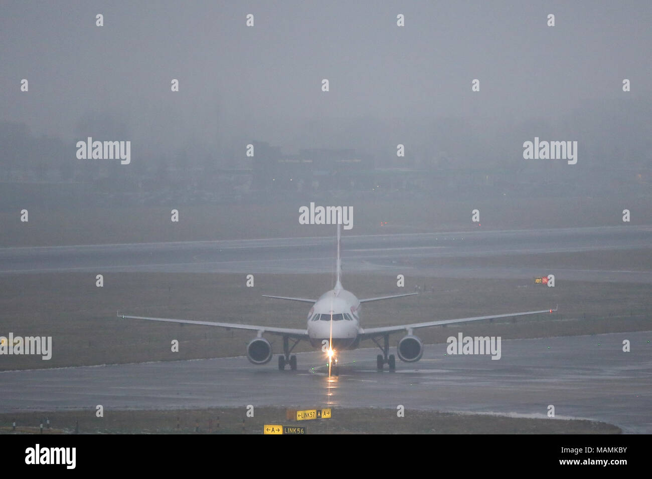 Aeroplanes lands in dense fog at London Heathrow Terminal 5 Featuring ...