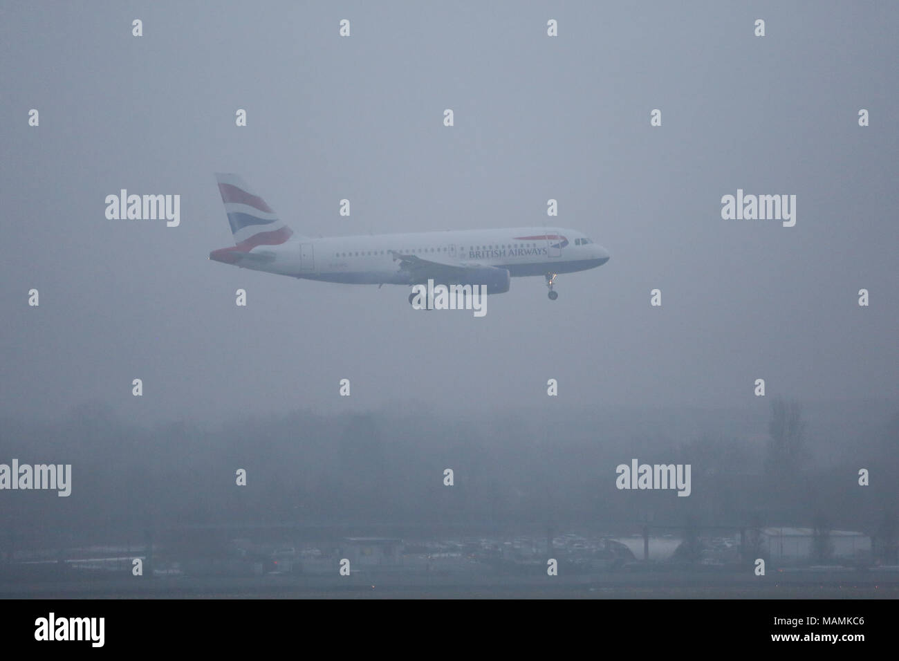 Aeroplanes lands in dense fog at London Heathrow Terminal 5 Featuring ...
