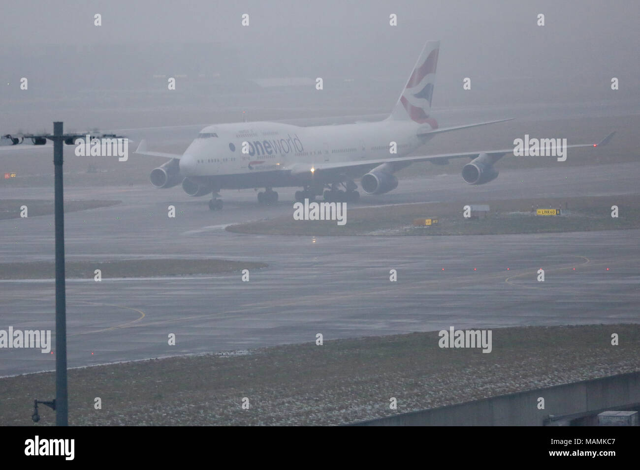 British airways planes lands in the fog at heathrow airport hi-res ...