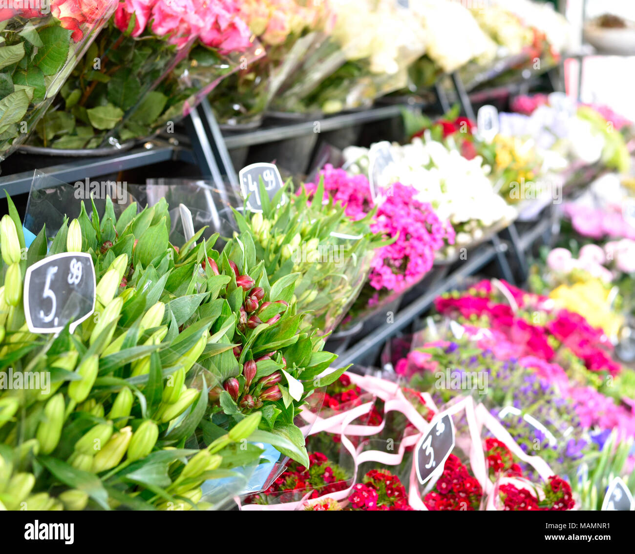 Flower bunches at a street market or market stall. Flower selling ...
