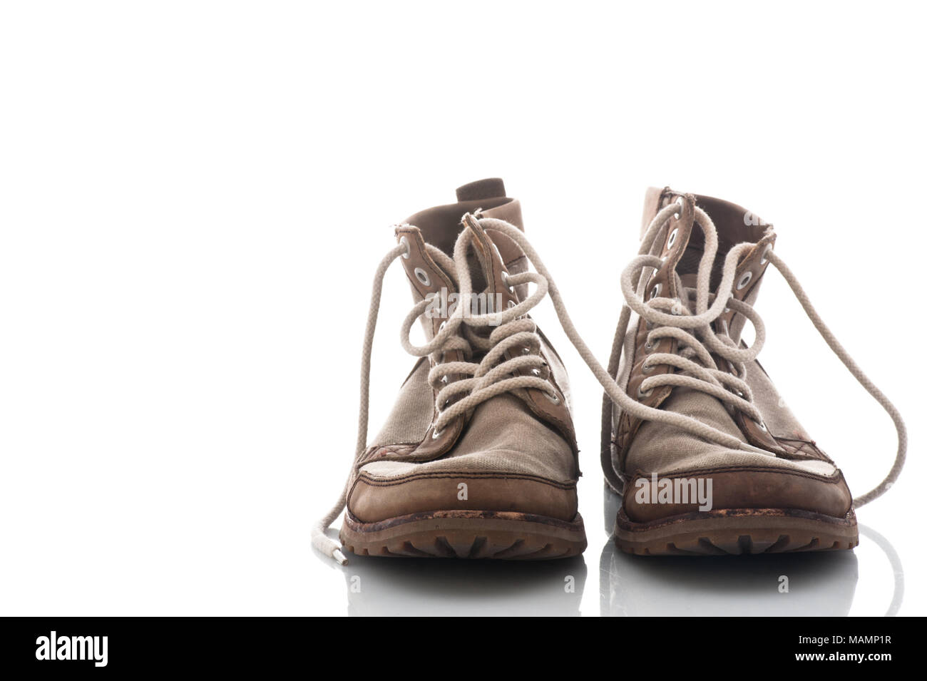 Old shoes on white background Stock Photo - Alamy