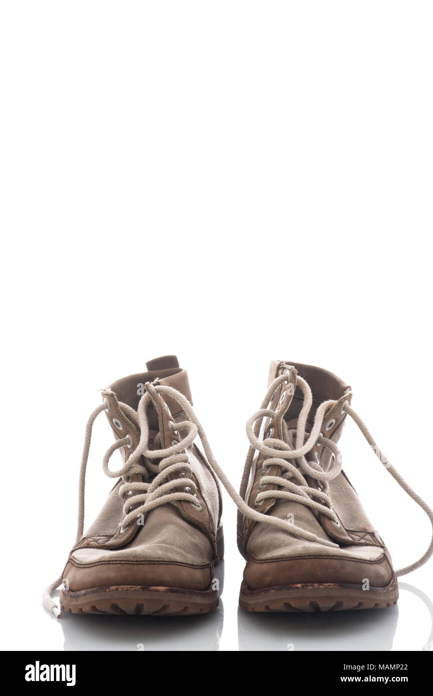 Old shoes on white background Stock Photo - Alamy
