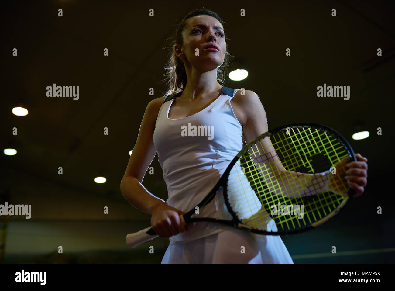 Girl holding tennis racket hi-res stock photography and images - Alamy