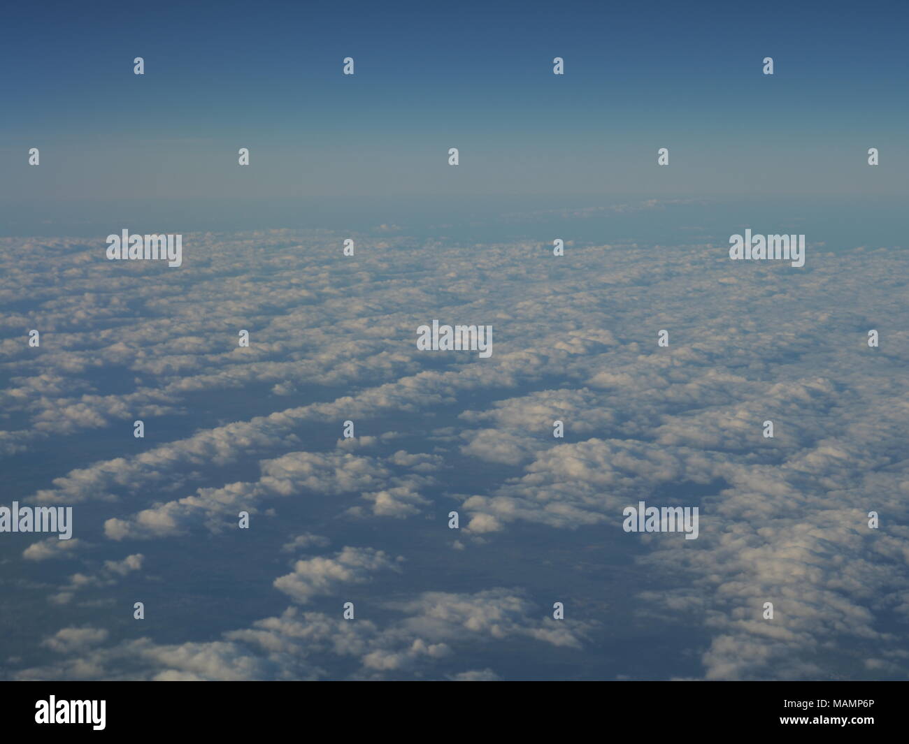 Beautiful panorama of blue sky and cloud as seen through window of an ...