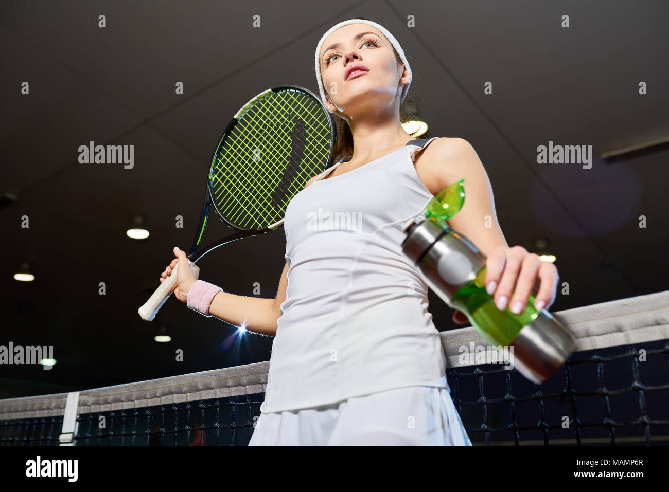 Tennis Player Taking Break at Court Stock Photo - Alamy
