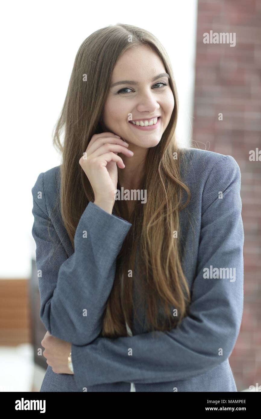 successful business woman on blurred background office Stock Photo - Alamy