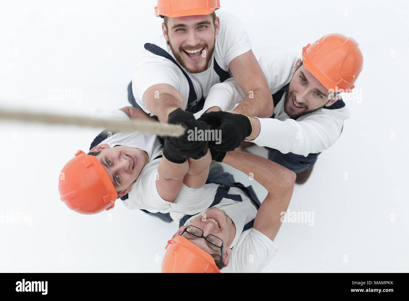 Construction worker pulling rope hi-res stock photography and images ...