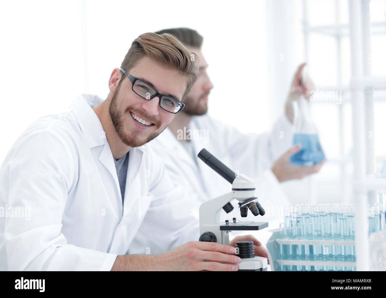 closeup. a biologist working in the laboratory Stock Photo - Alamy