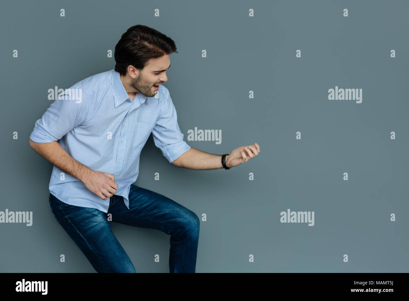 Man with musical instrument hi-res stock photography and images - Alamy