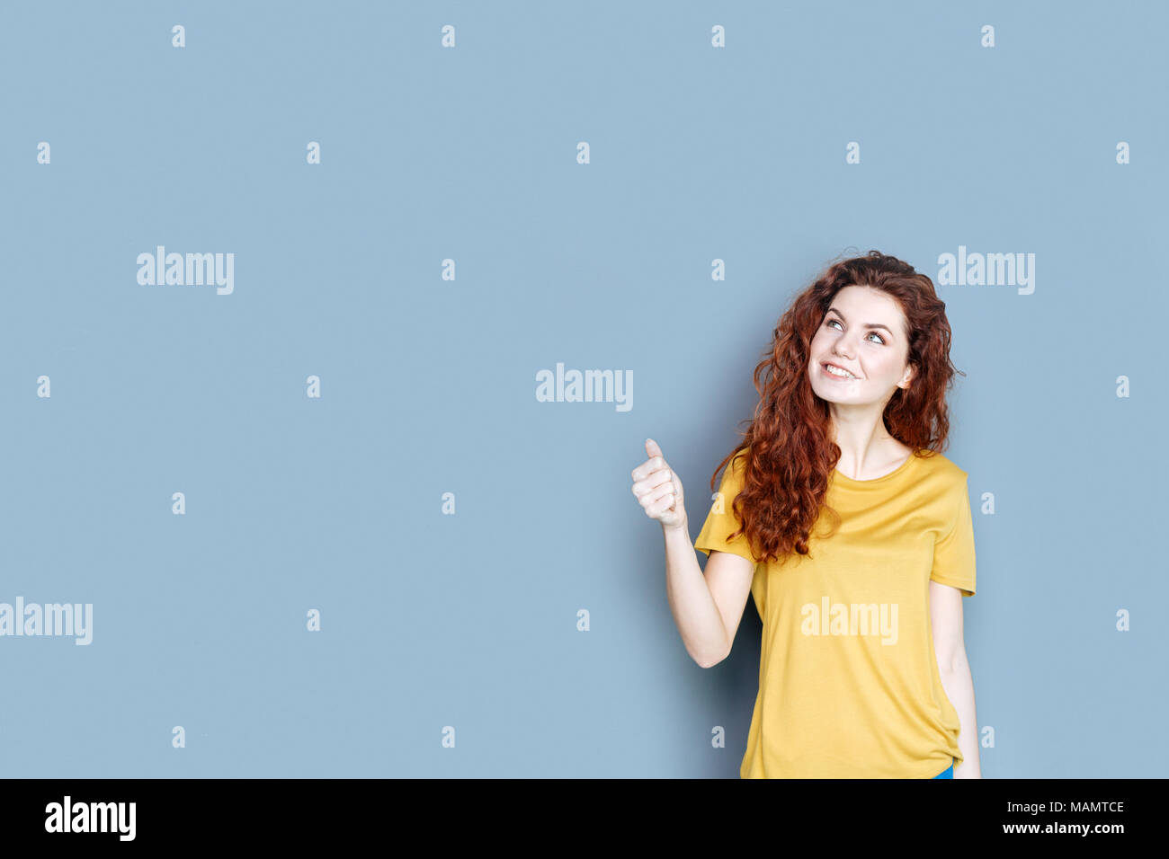 Pleasant delighted woman sharing her emotions Stock Photo - Alamy