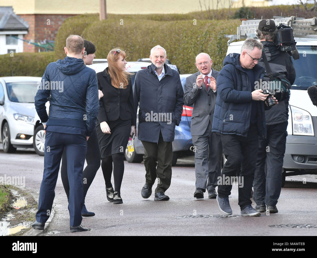 Labour leader Jeremy Corbyn (centre) and Shadow education secretary ...