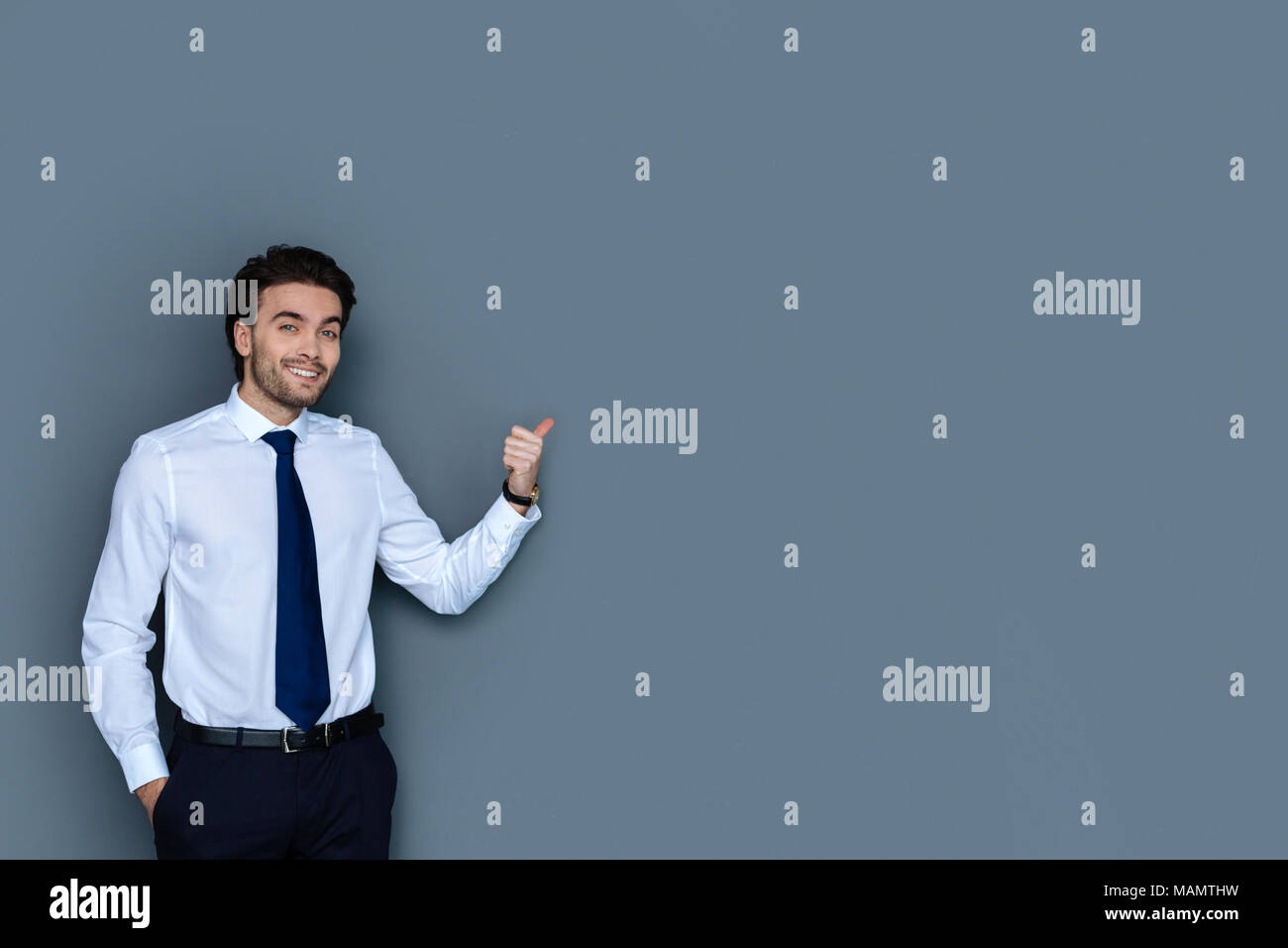 Smart confident man smiling Stock Photo - Alamy