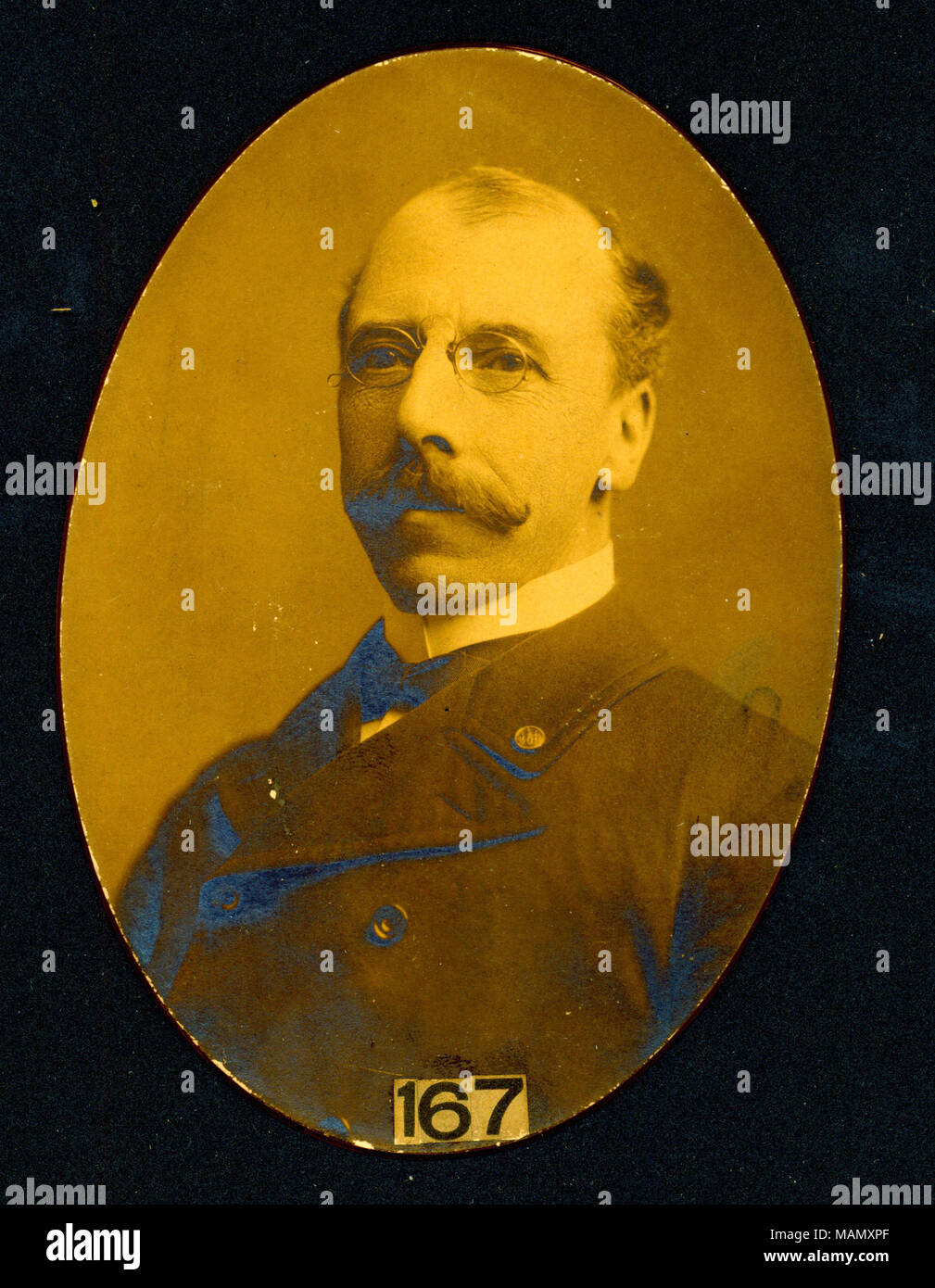 Formal bust portrait of George Pohl wearing a suit, bow tie, and ...