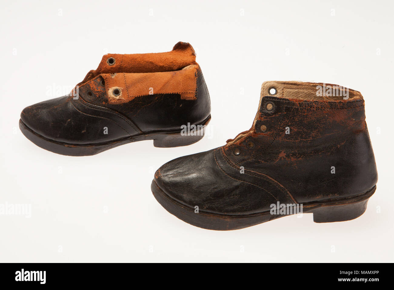 Pair of handmade boy's leather shoes with wooden soles. Title: Handmade ...