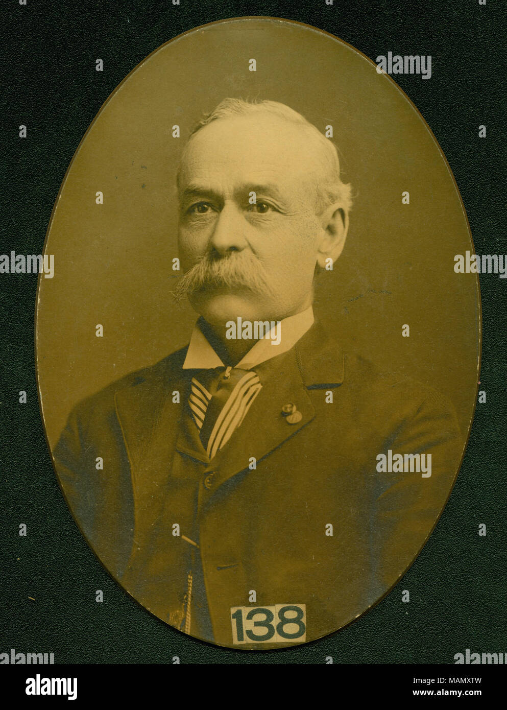 Formal bust portrait of H. D. O'Brien wearing a suit, turned slightly ...