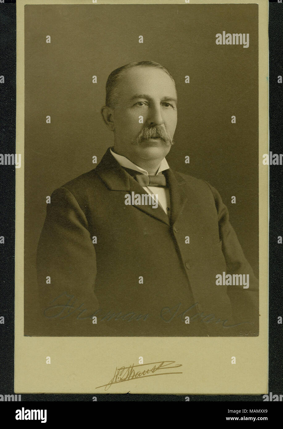 Formal half-length portrait of Herman Sloan wearing a suit and bow tie ...