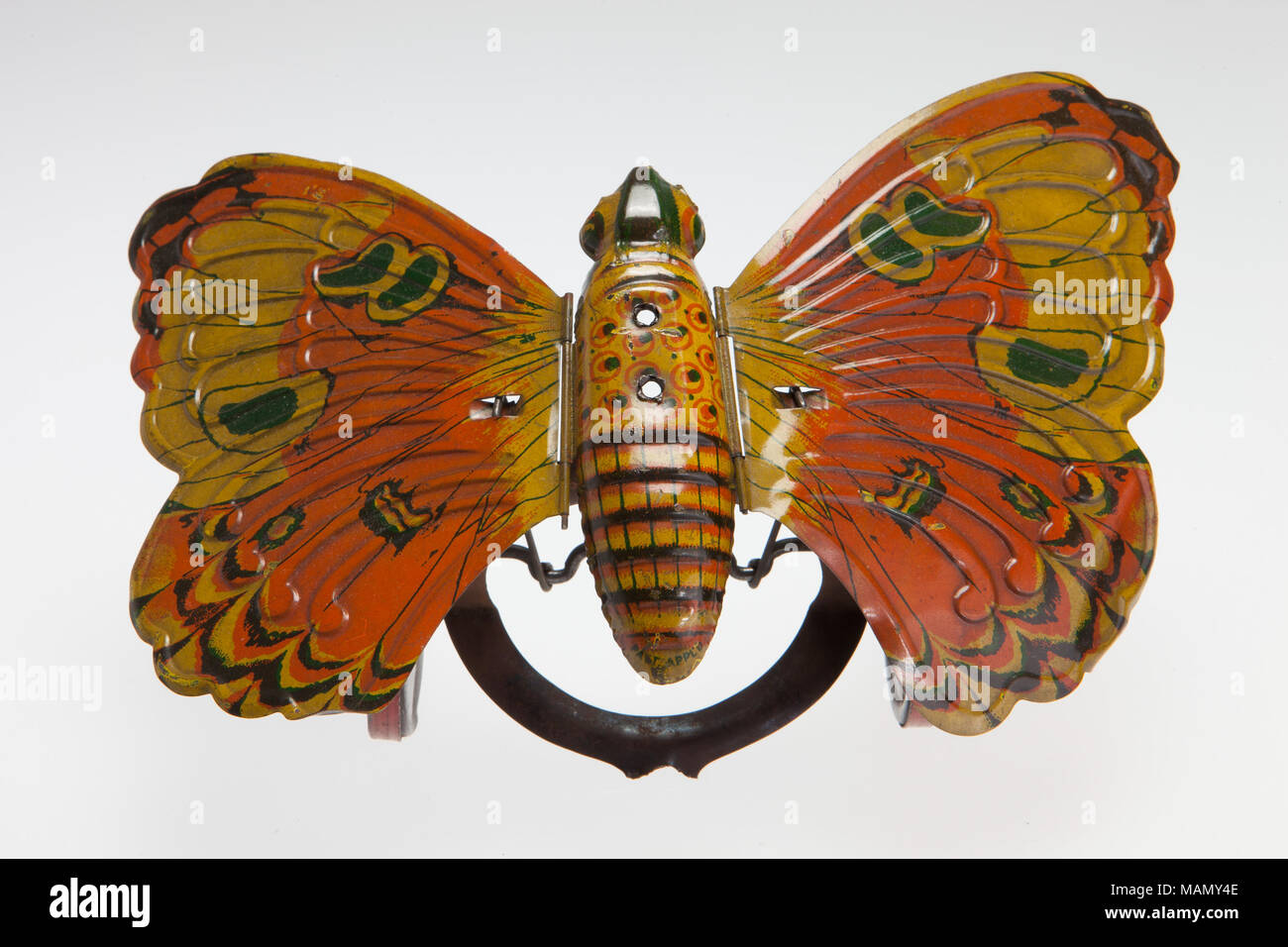 Lithographed tin butterfly push toy used by Ralph Pumphrey as a child ...